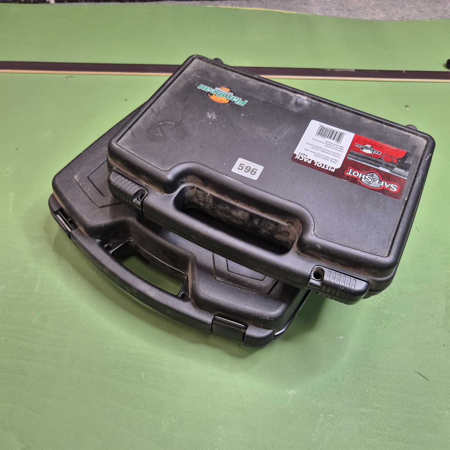 Lot 596 - Three Hard shell padded pistol transit cases.