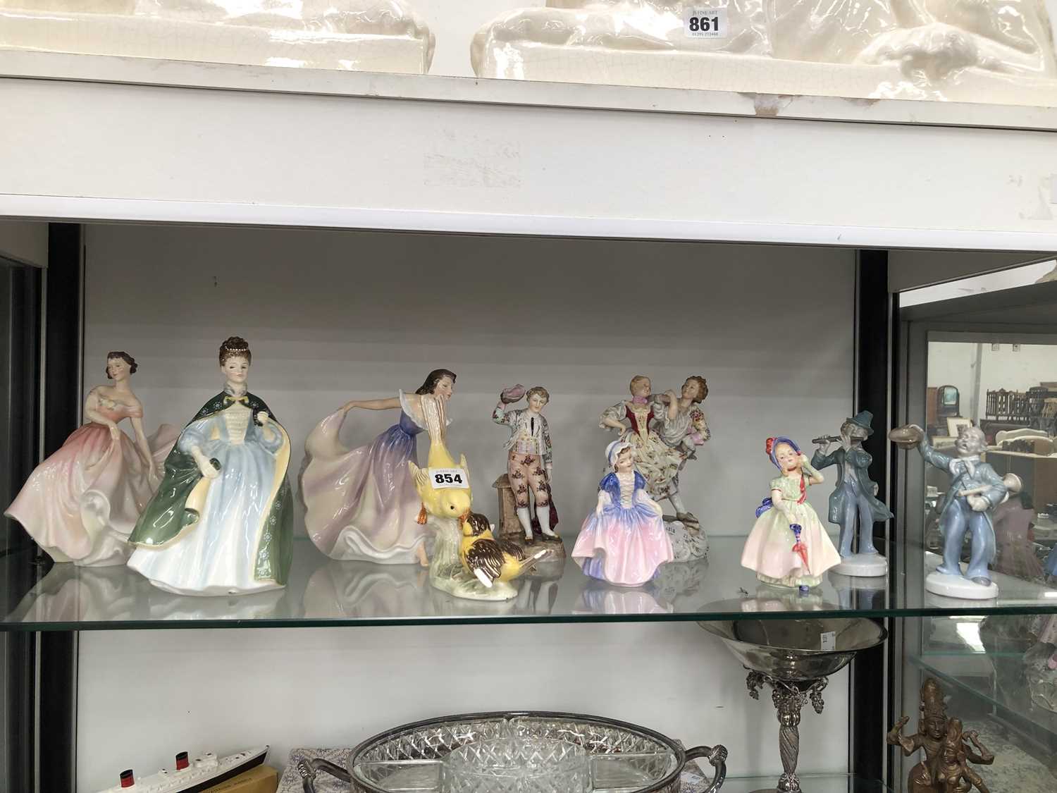 Lot 854 - Ten ceramic figures by Doulton, Goebbels,