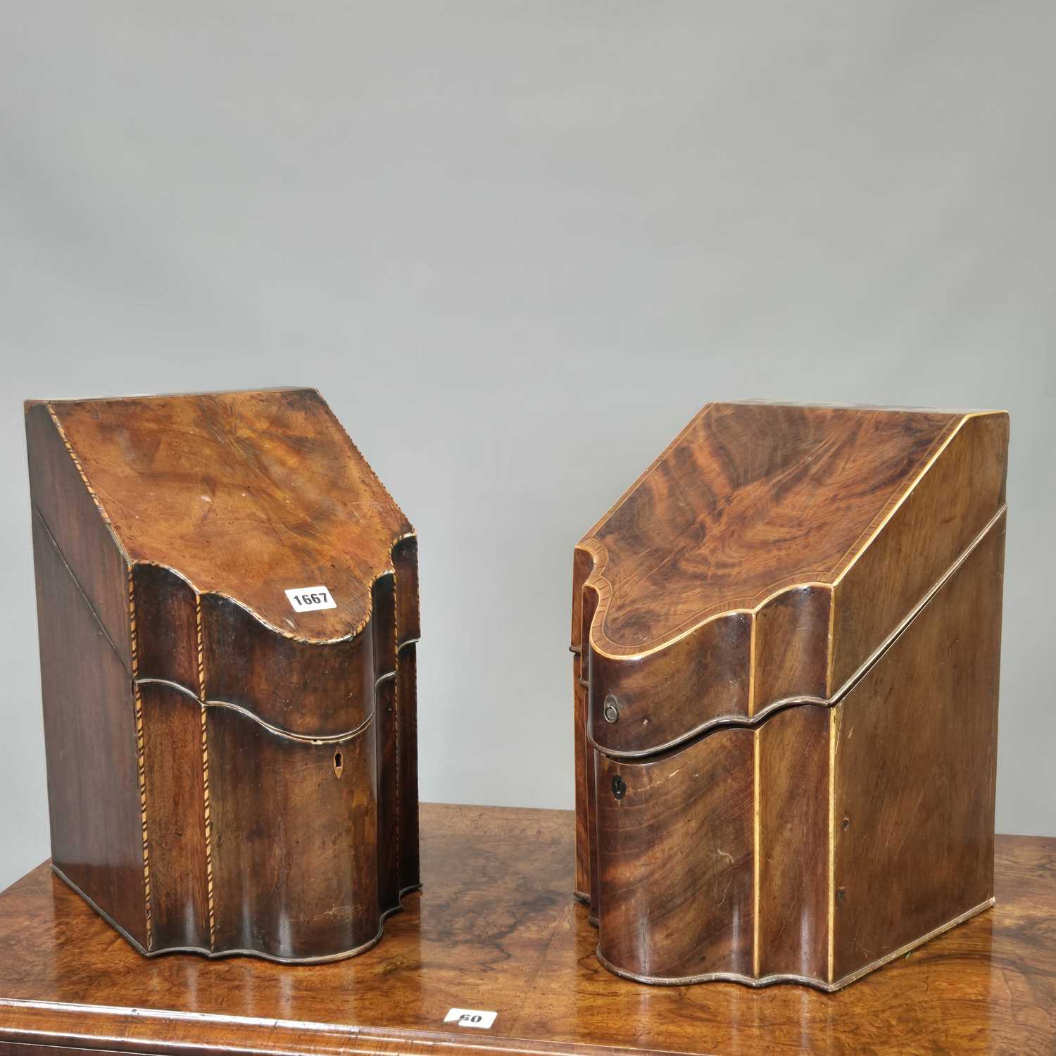 Lot 1667 - Two similar George III mahogany knife boxes.