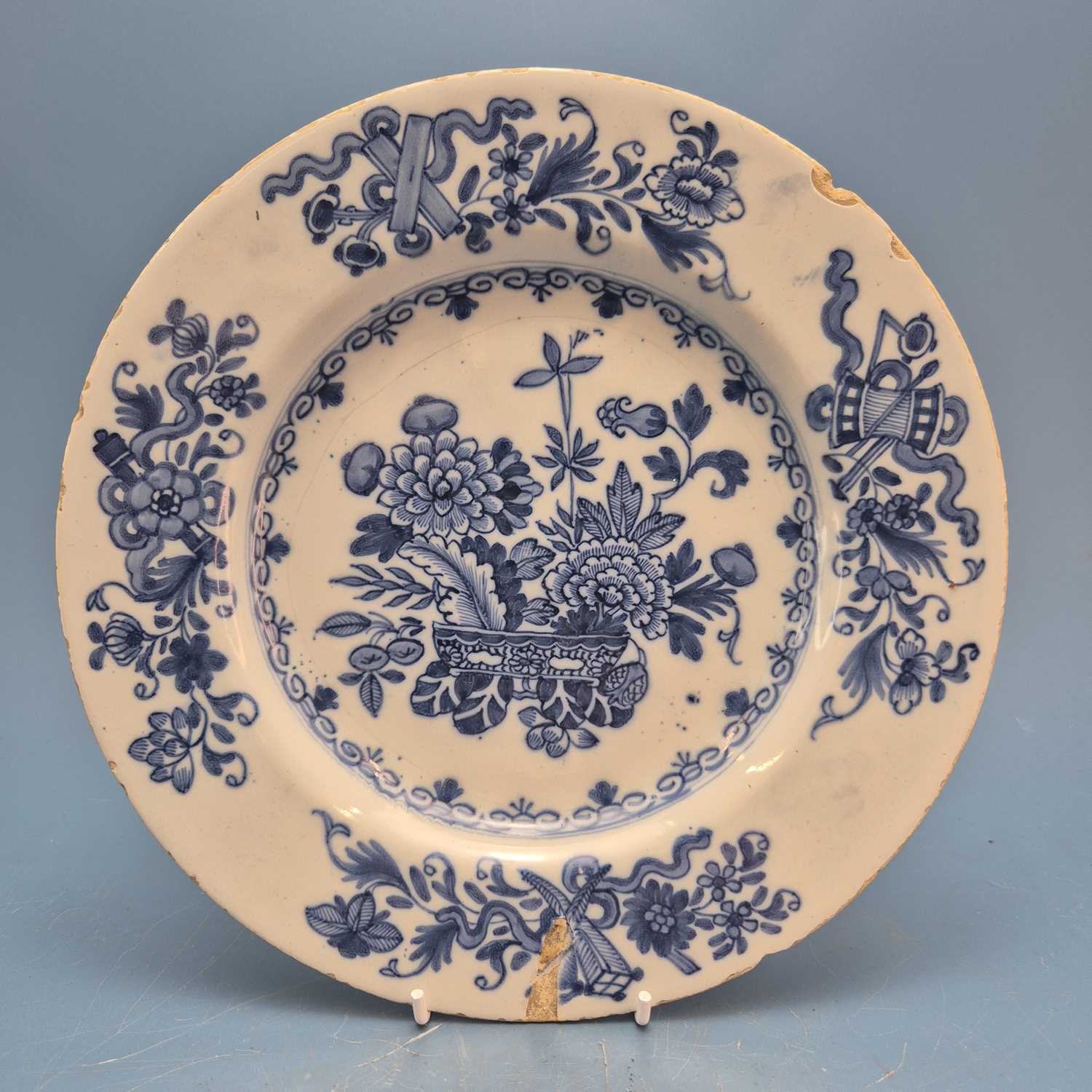 Lot 834 - Three antique Delft blue and white dishes.