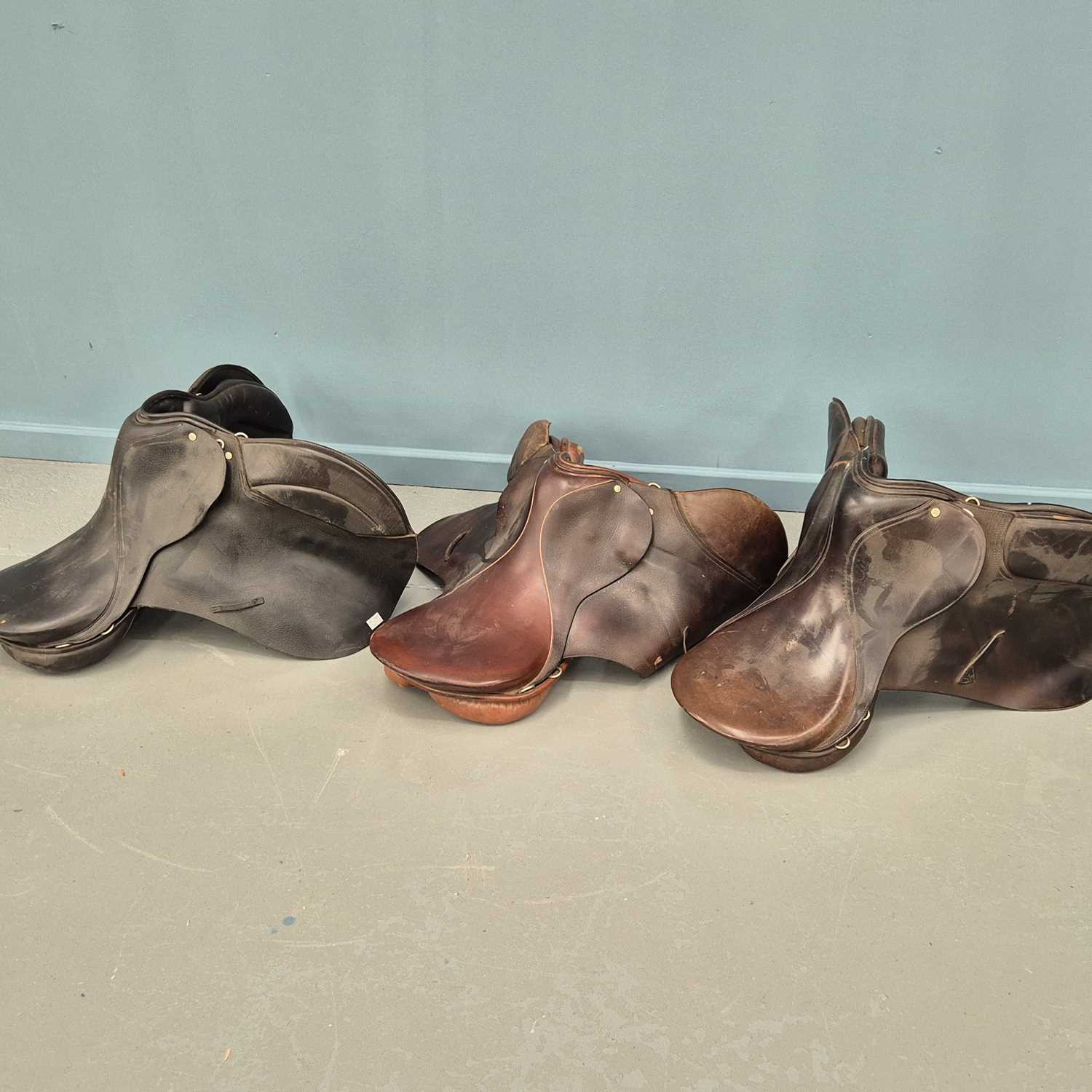 Lot 740 - Three vintage leather horse saddles, a