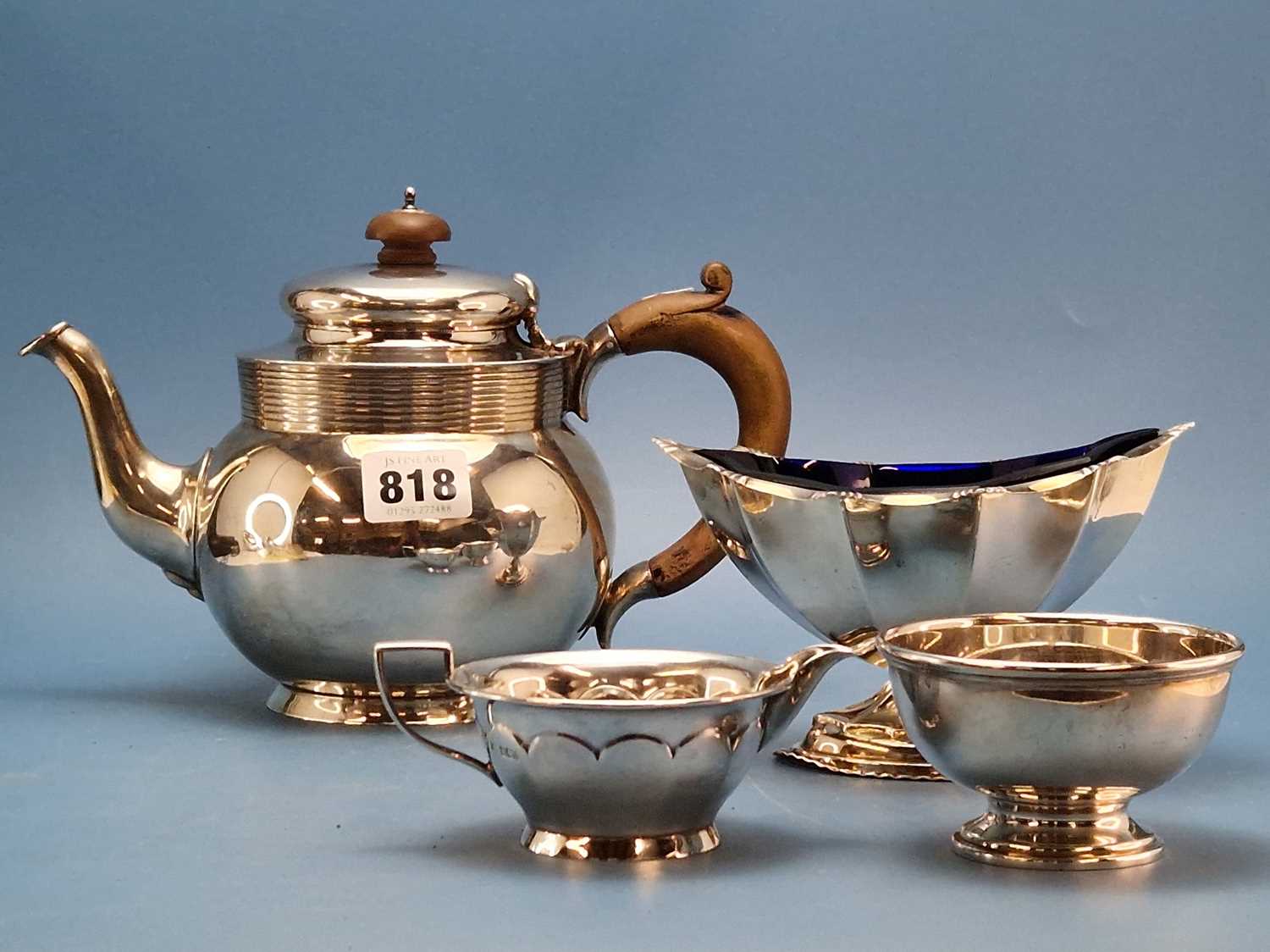 Lot 818 - A silver tea pot, London 1860, a blue glass