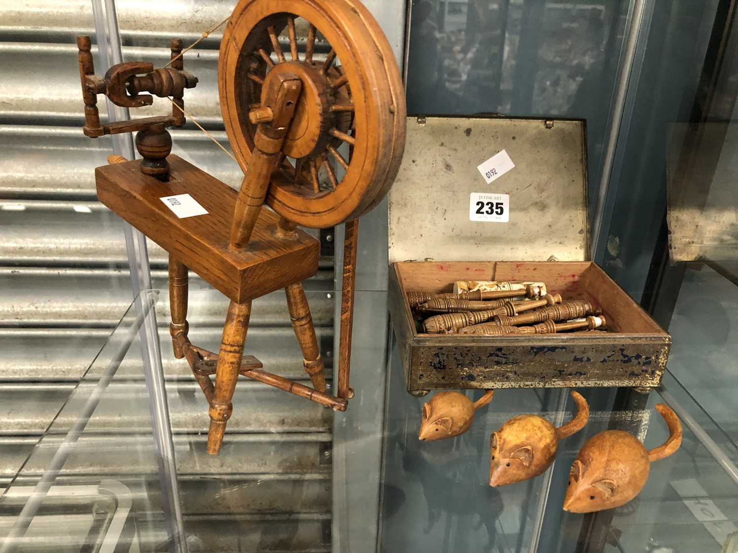 Lot 235 - A carved wood scale model spinning machine,