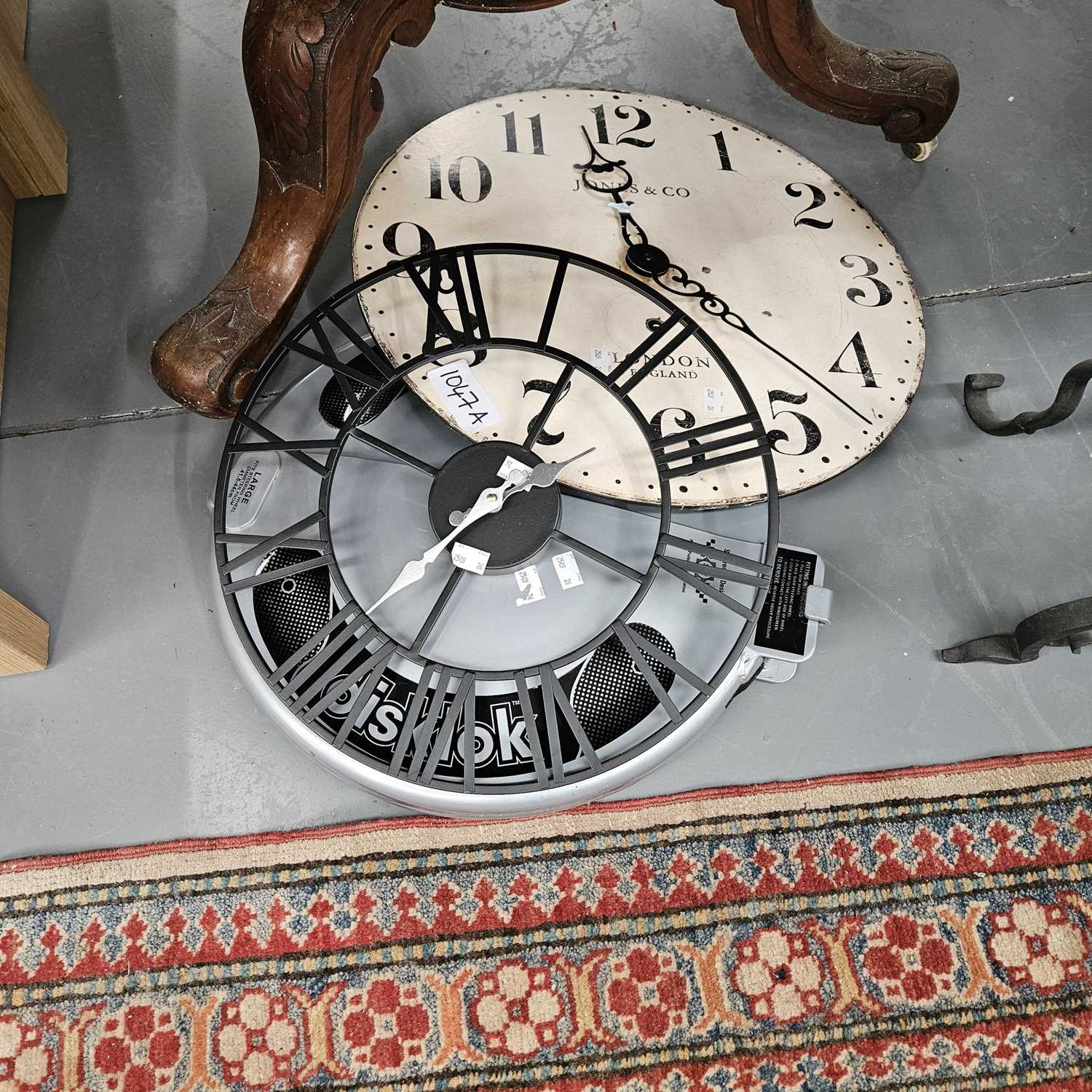 Lot 1047 - Two electric vintage-style wall clocks
