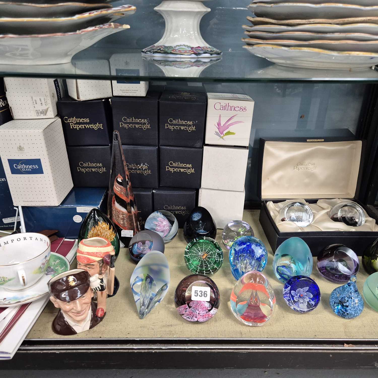 Lot 536 - A collection of Caithness glass paperweights,