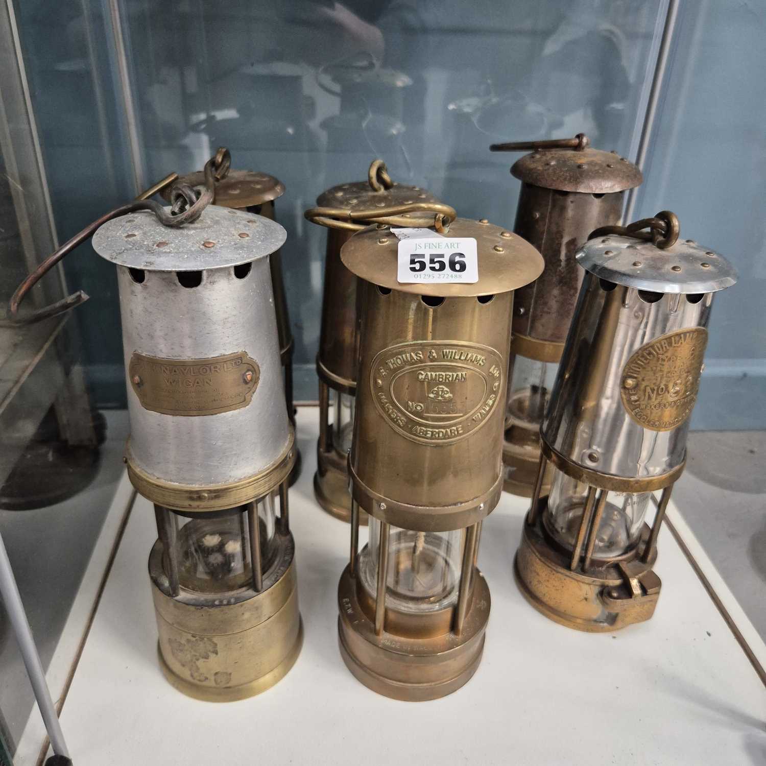 Lot 556 - Six various miner's lamps