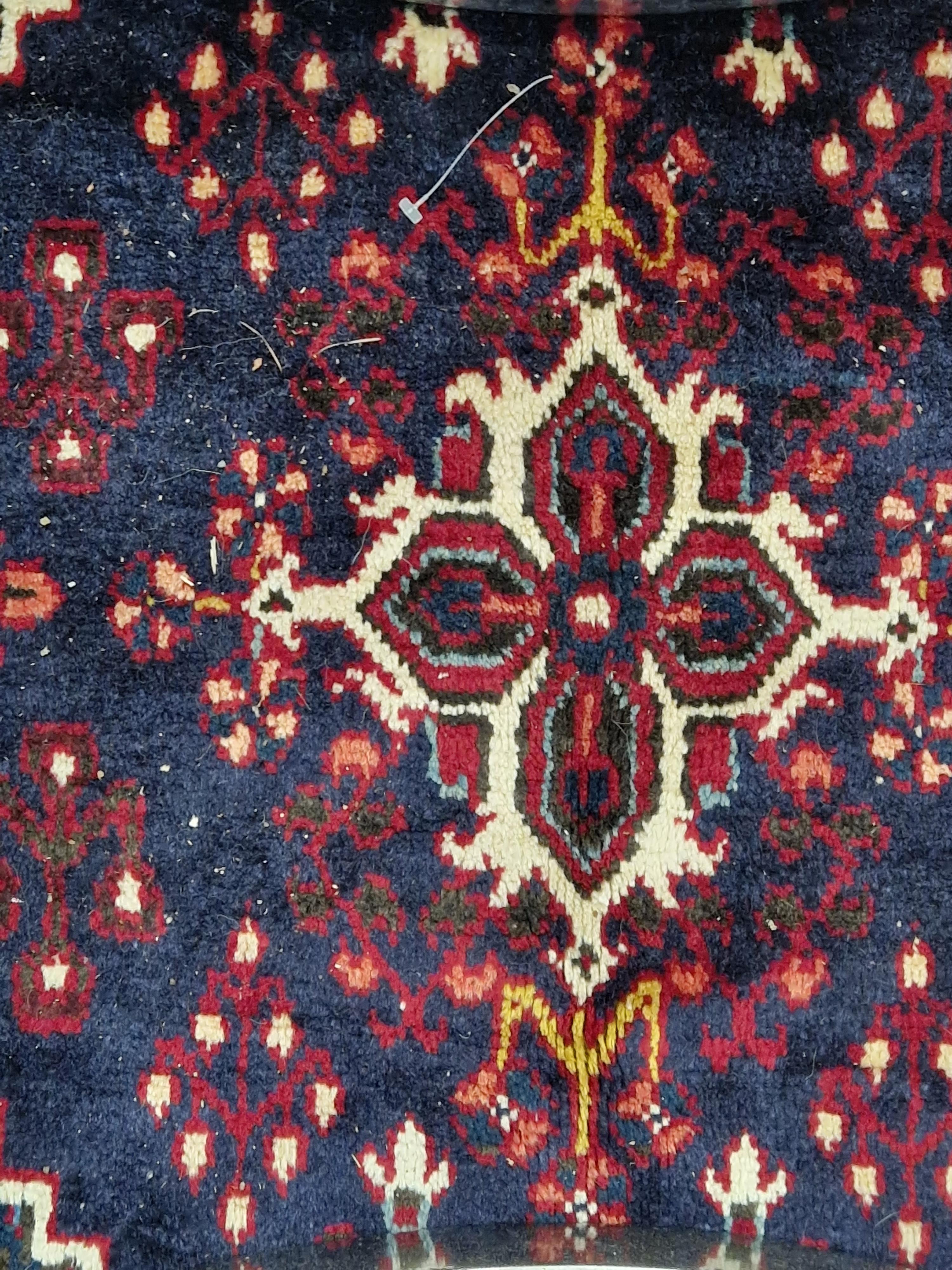 Lot 1197 - A Persian Joshegan carpet. 347 x 242cm